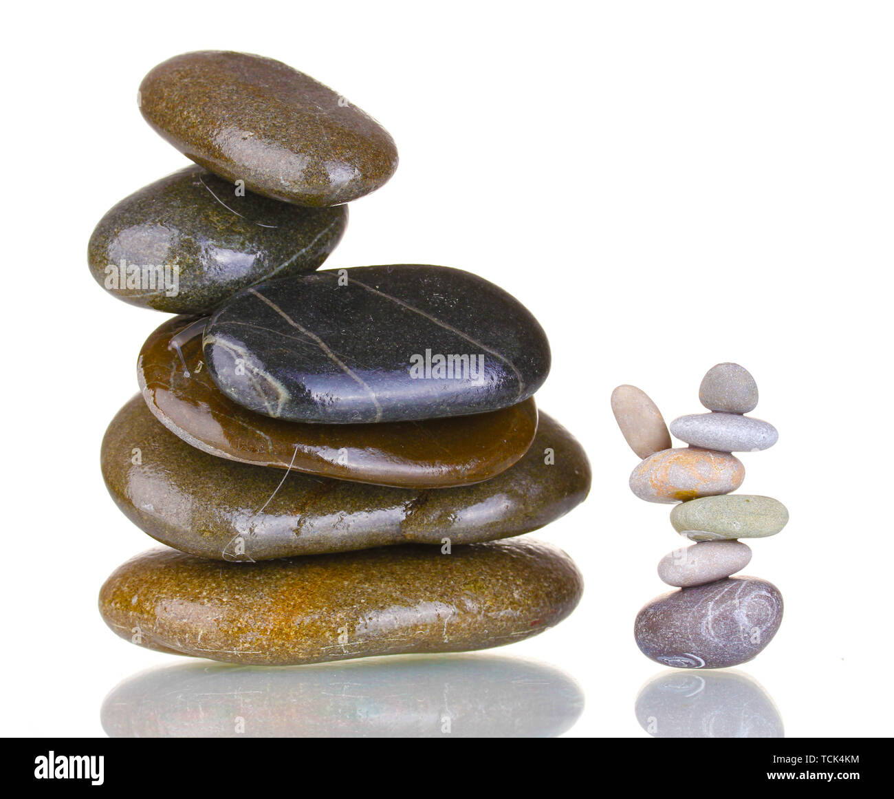 Stacks of balanced stones isolated on white Stock Photo - Alamy