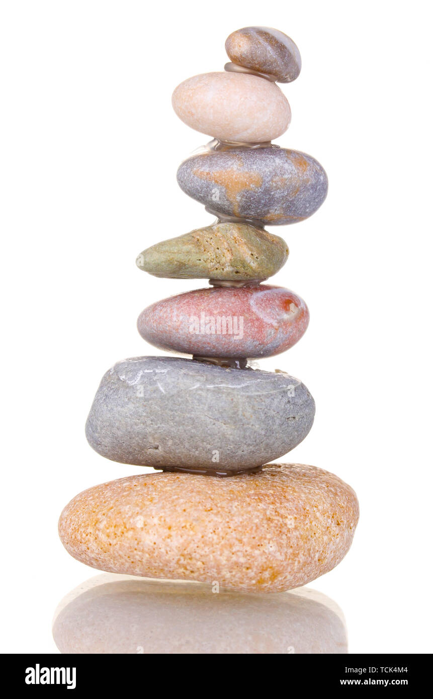 Stack of balanced stones isolated on white Stock Photo - Alamy