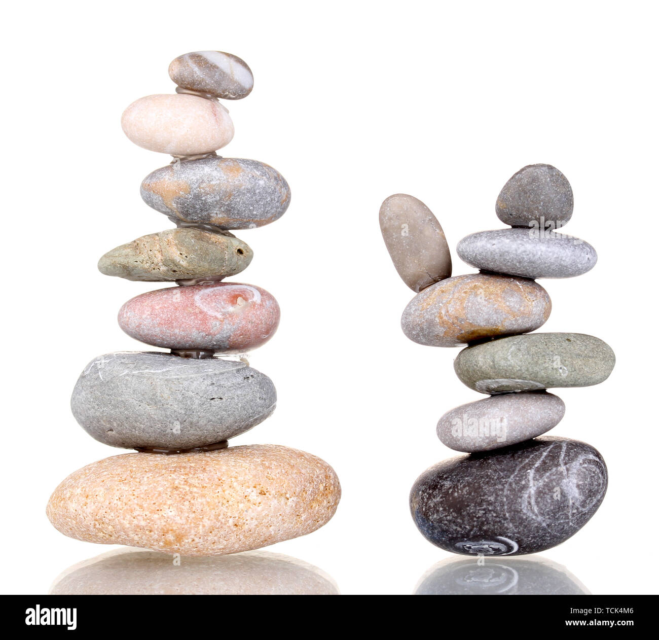 Stacks of balanced stones isolated on white Stock Photo - Alamy