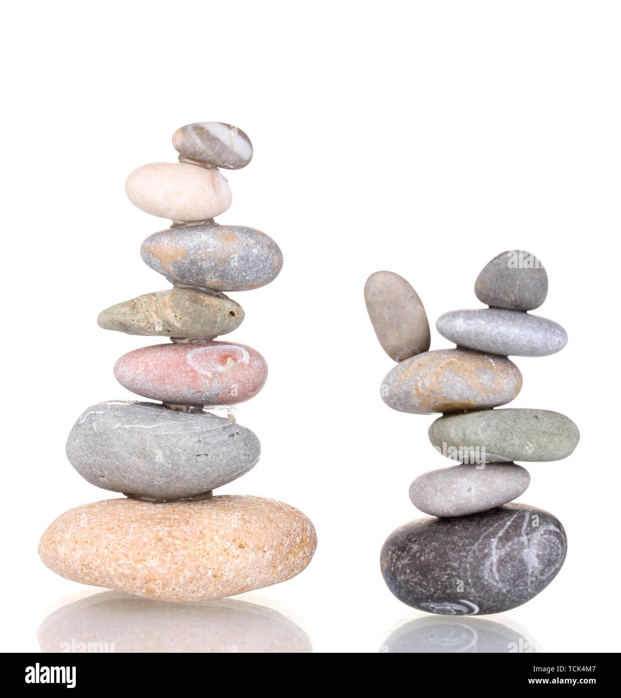 Stacks of balanced stones isolated on white Stock Photo - Alamy