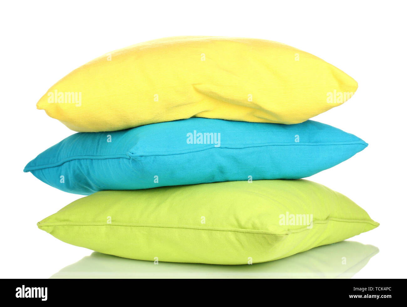 Bright color pillows isolated on white Stock Photo - Alamy
