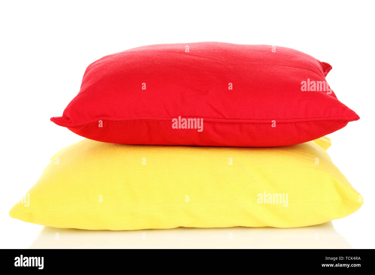Bright color pillows isolated on white Stock Photo - Alamy
