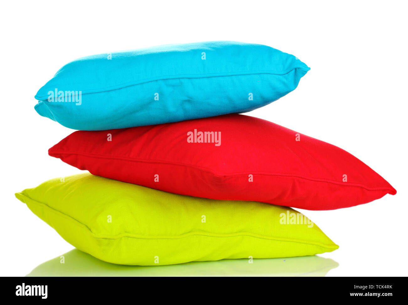 Bright color pillows isolated on white Stock Photo - Alamy