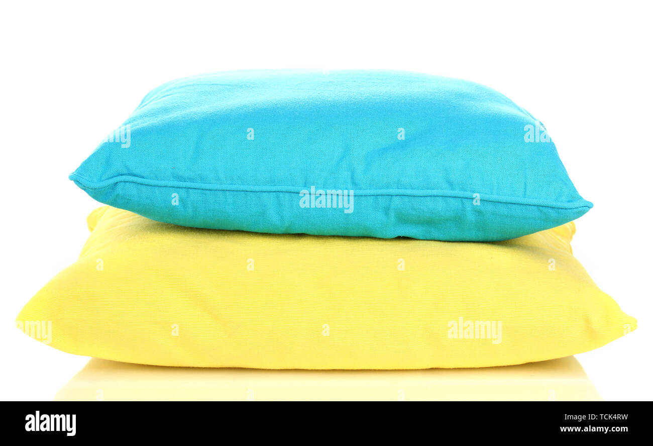Bright color pillows isolated on white Stock Photo - Alamy