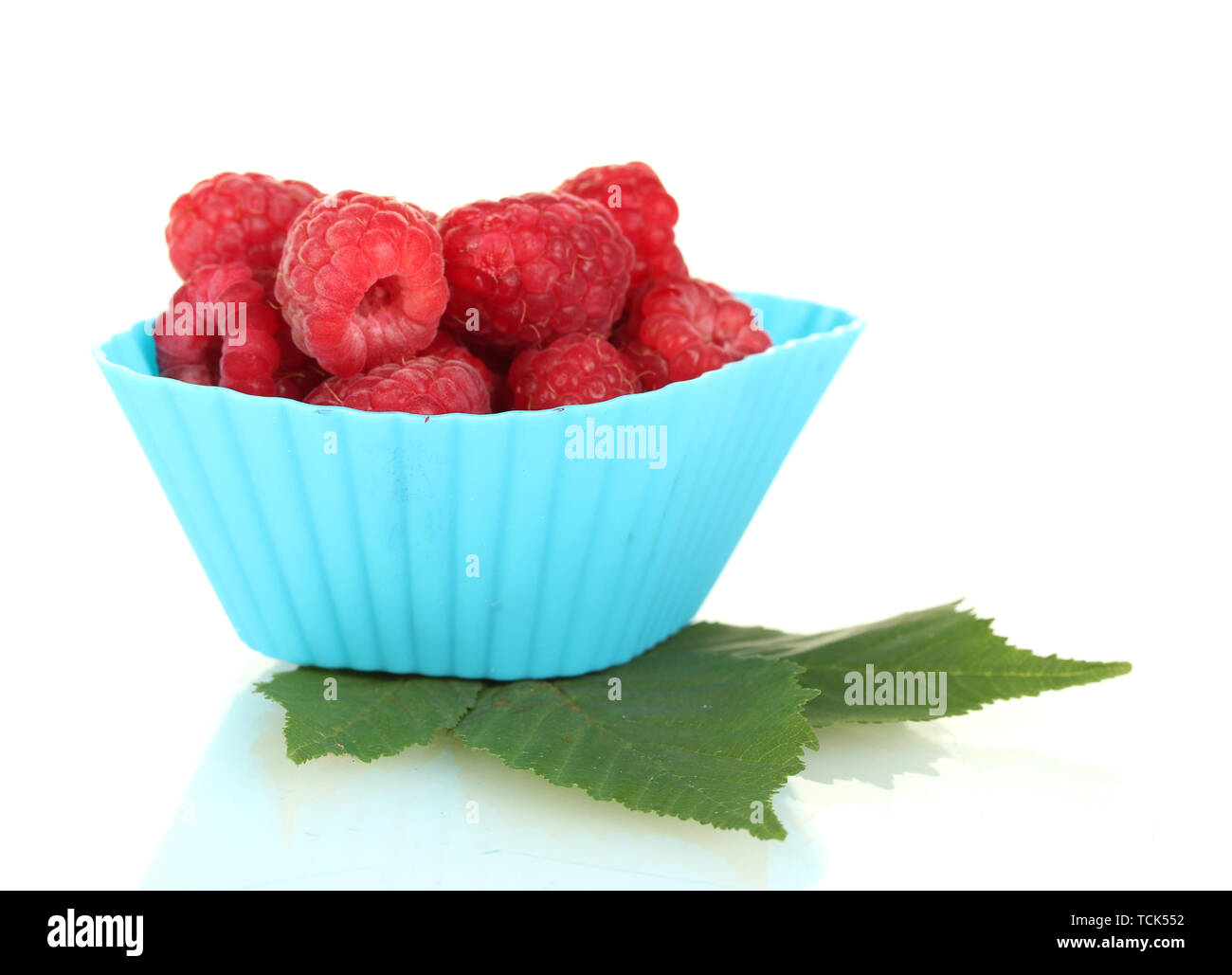 Fresh raspberries in silicone mold isolated on white Stock Photo - Alamy