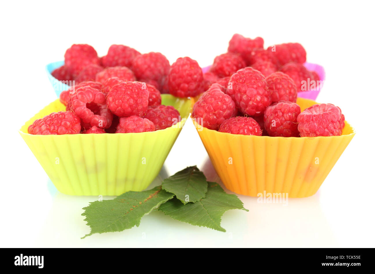 Fresh raspberries in silicone molds isolated on white Stock Photo - Alamy