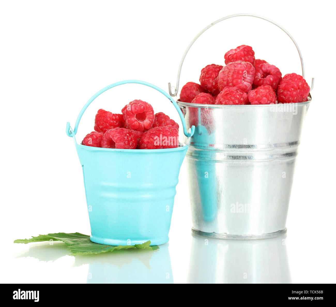 Fresh raspberries in buckets isolated on white Stock Photo - Alamy