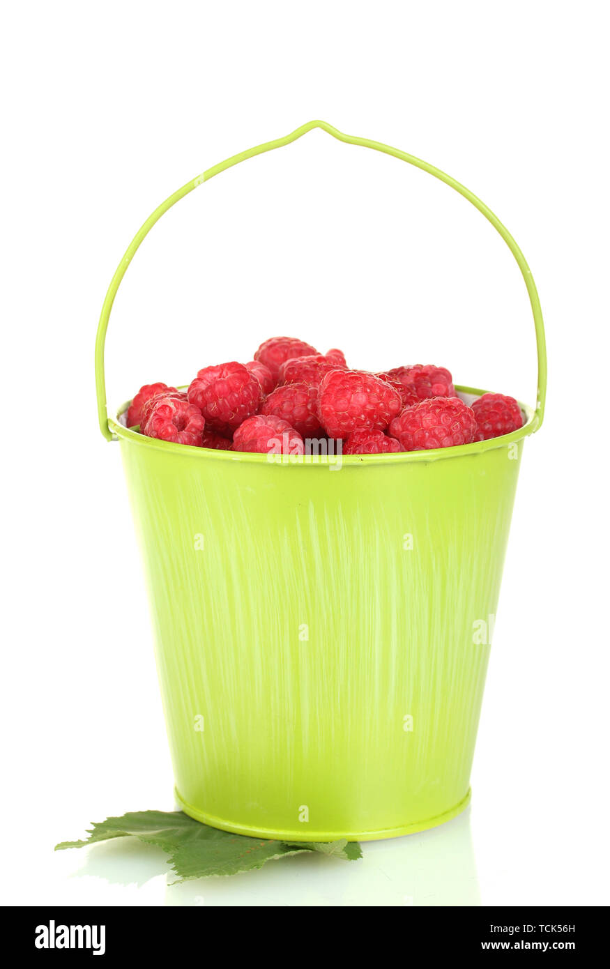 Fresh raspberries in green bucket isolated on white Stock Photo - Alamy