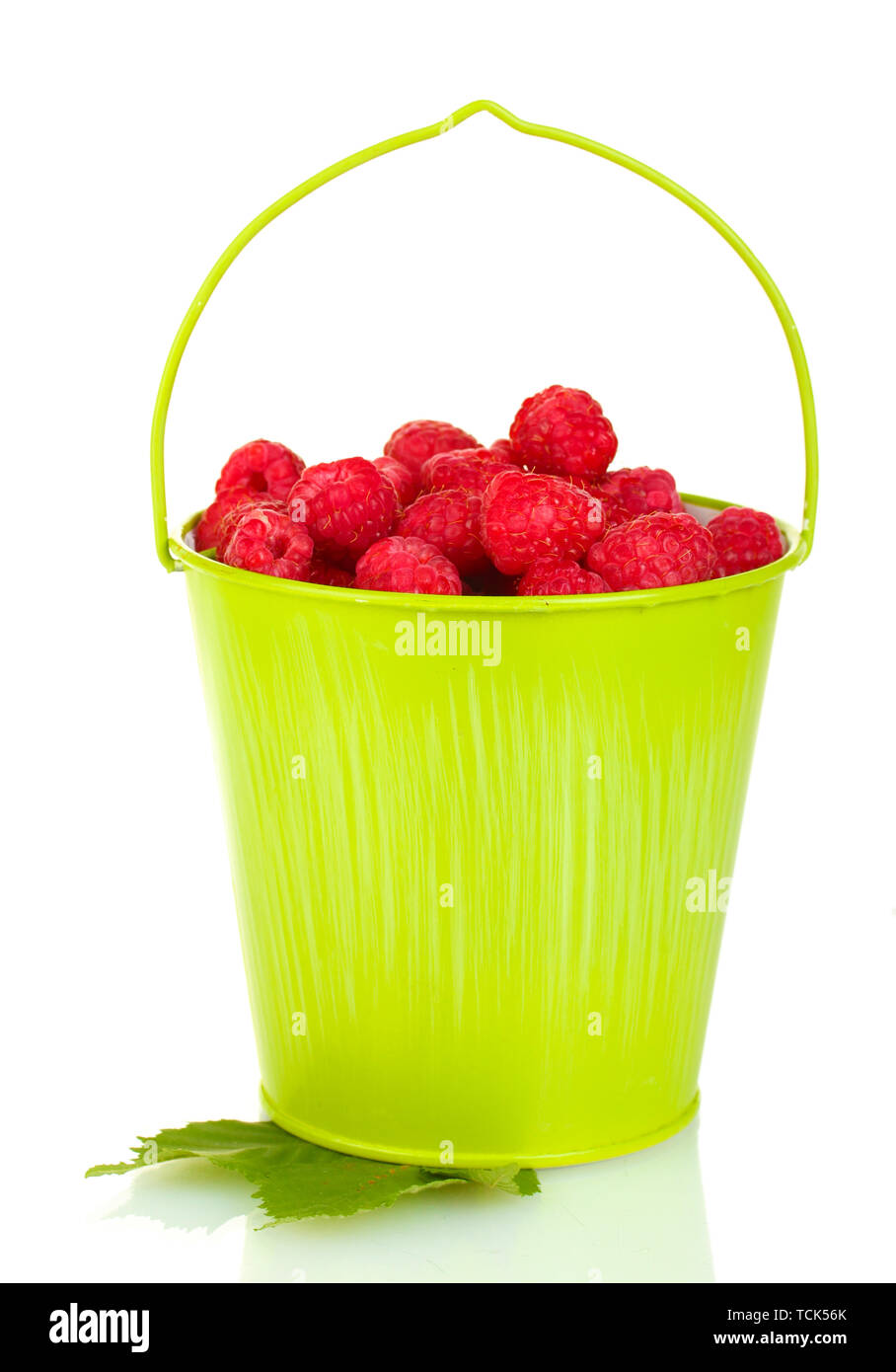 Fresh raspberries in green bucket isolated on white Stock Photo - Alamy