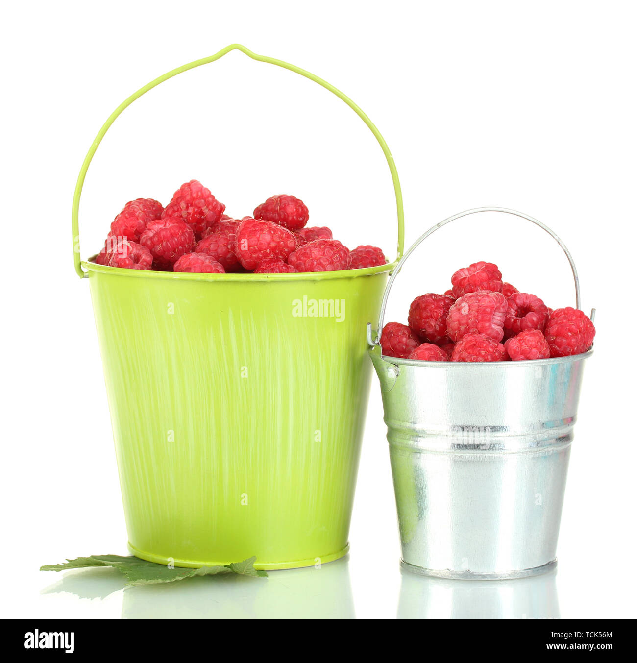 Fresh raspberries in buckets isolated on white Stock Photo - Alamy