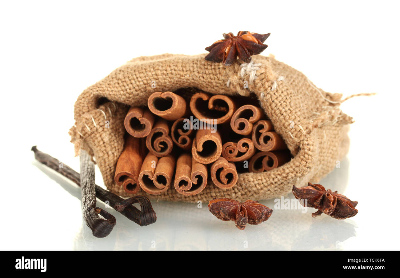 Vanilla pods with spices isolated on white Stock Photo - Alamy