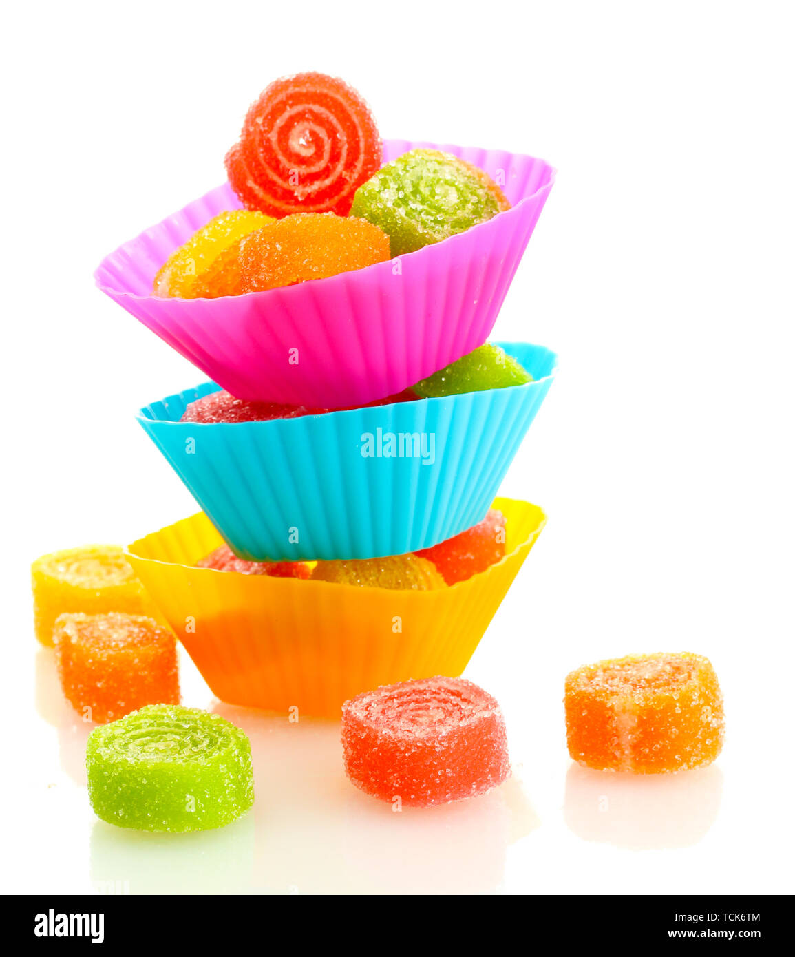 sweet jelly candies in cup cake cases isolated on white Stock Photo - Alamy