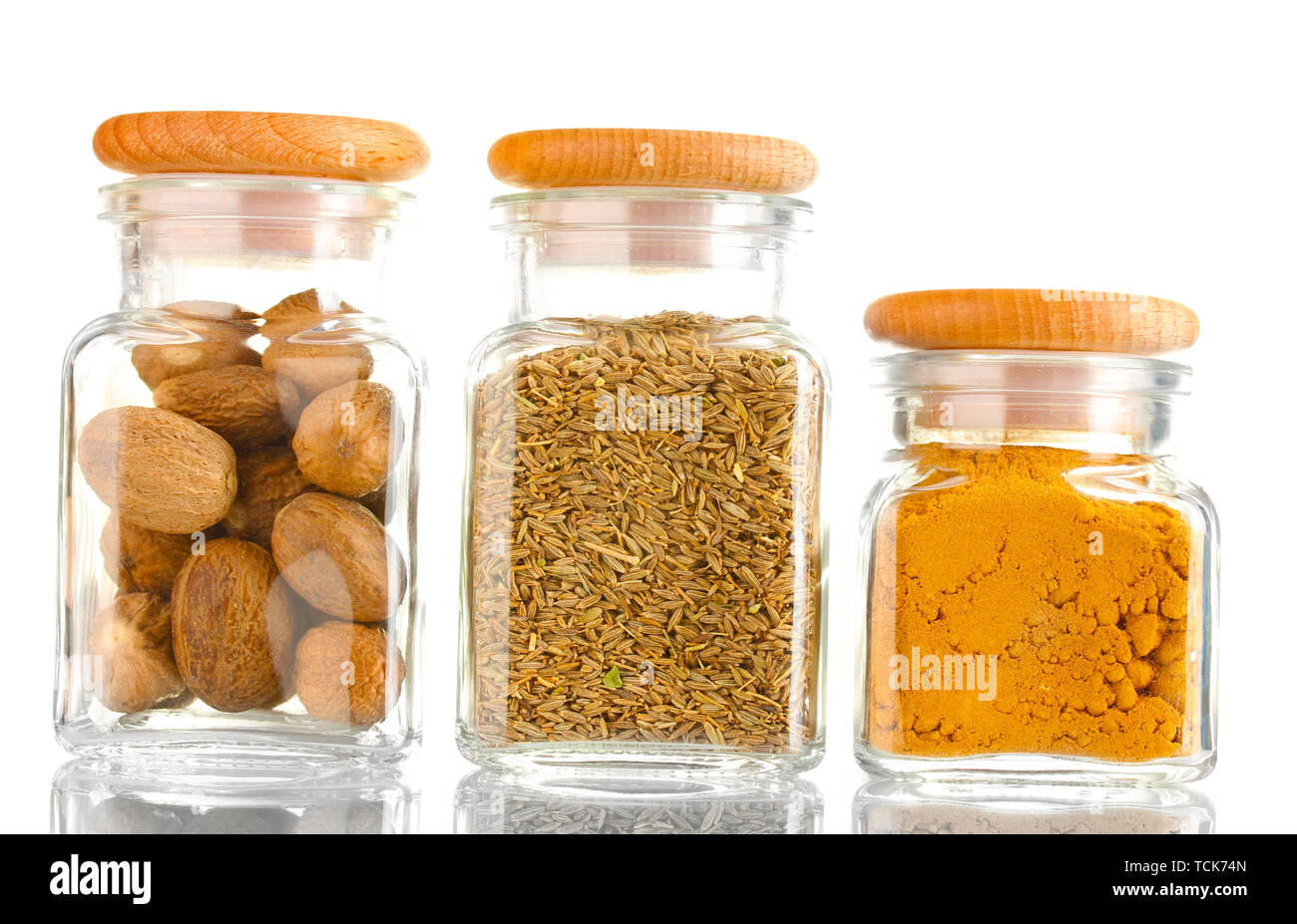 powder spices in glass jars isolated on white Stock Photo - Alamy