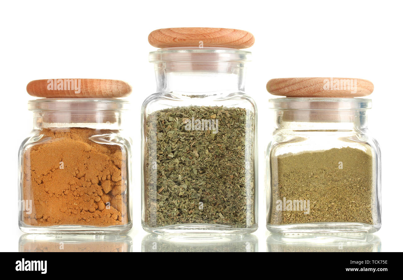 powder spices in glass jars isolated on white Stock Photo - Alamy