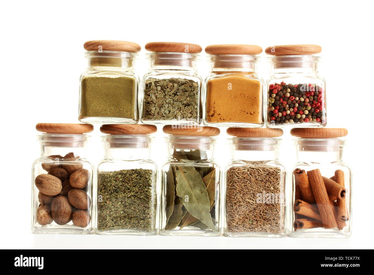 powder spices in glass jars isolated on white Stock Photo - Alamy