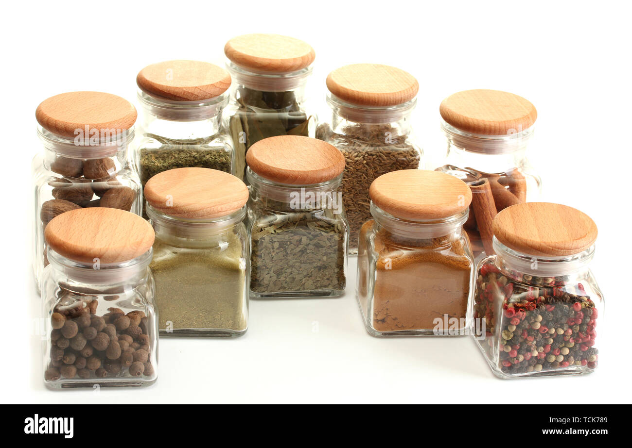 powder spices in glass jars isolated on white Stock Photo - Alamy