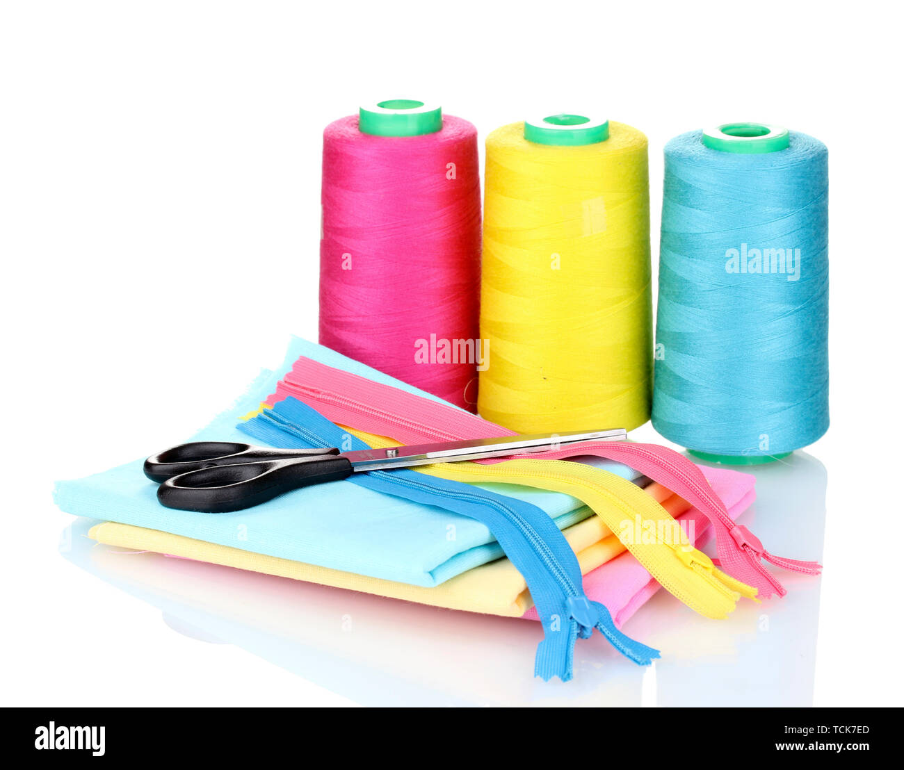 Sewing accessories and fabric isolated on white Stock Photo - Alamy