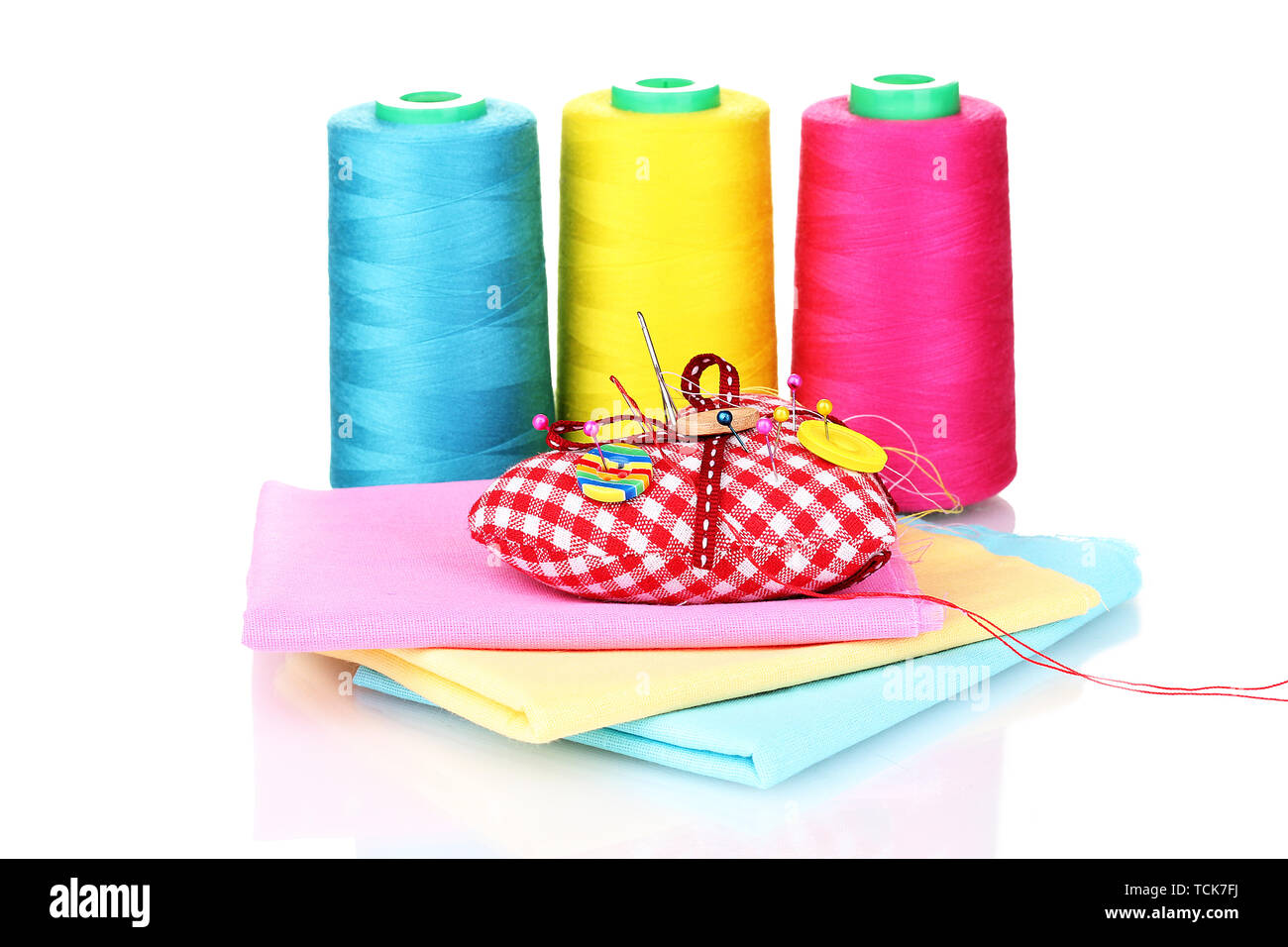 Sewing accessories and fabric isolated on white Stock Photo - Alamy