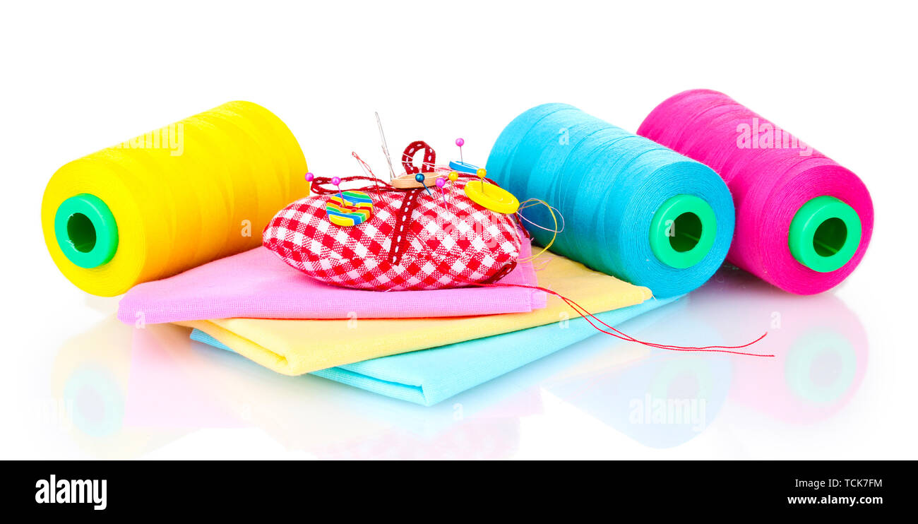 Sewing accessories and fabric isolated on white Stock Photo - Alamy