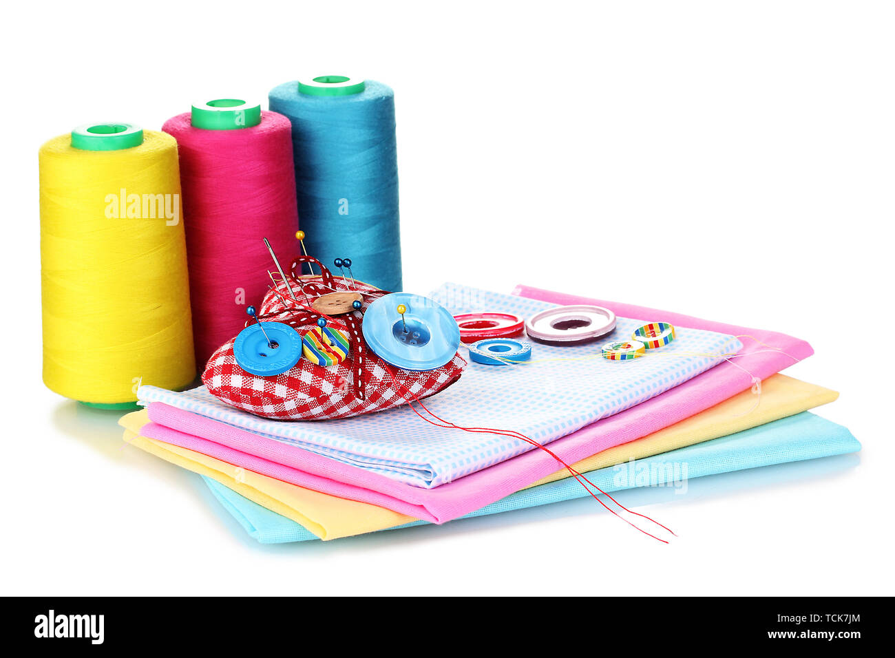 Sewing accessories and fabric isolated on white Stock Photo - Alamy