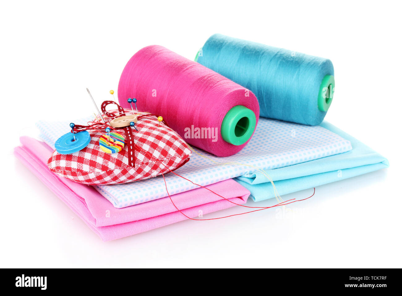 Sewing accessories and fabric isolated on white Stock Photo - Alamy