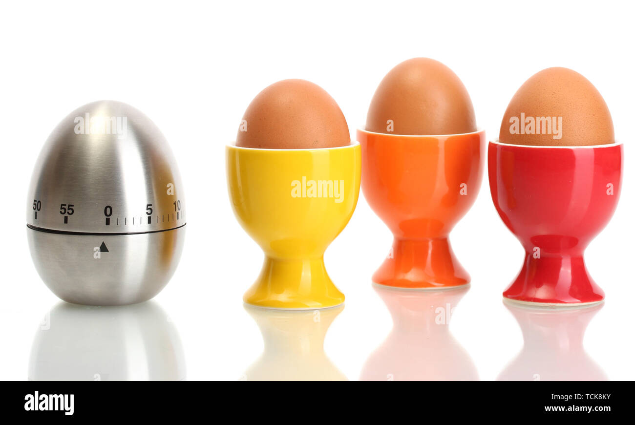 egg timer and egg in color stand isolated on white Stock Photo - Alamy