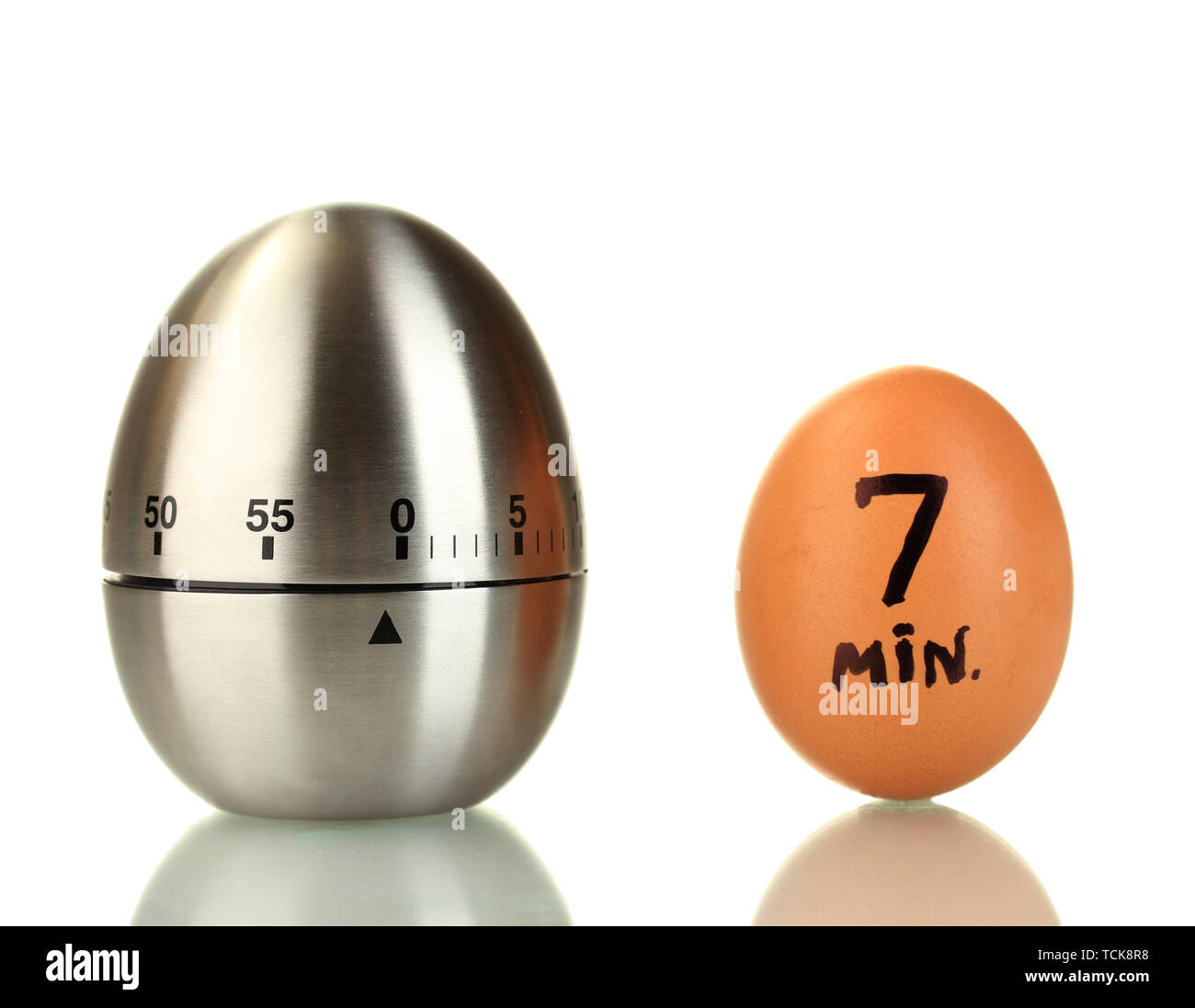 egg timer and egg isolated on white Stock Photo - Alamy