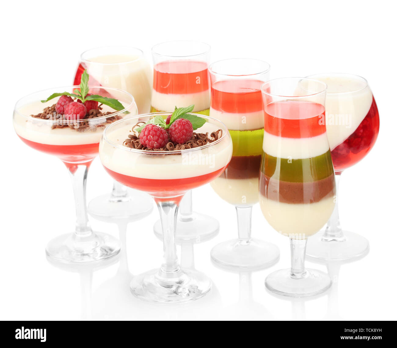 fruit jelly with chocolate and pberries in glasses isolated on white ...