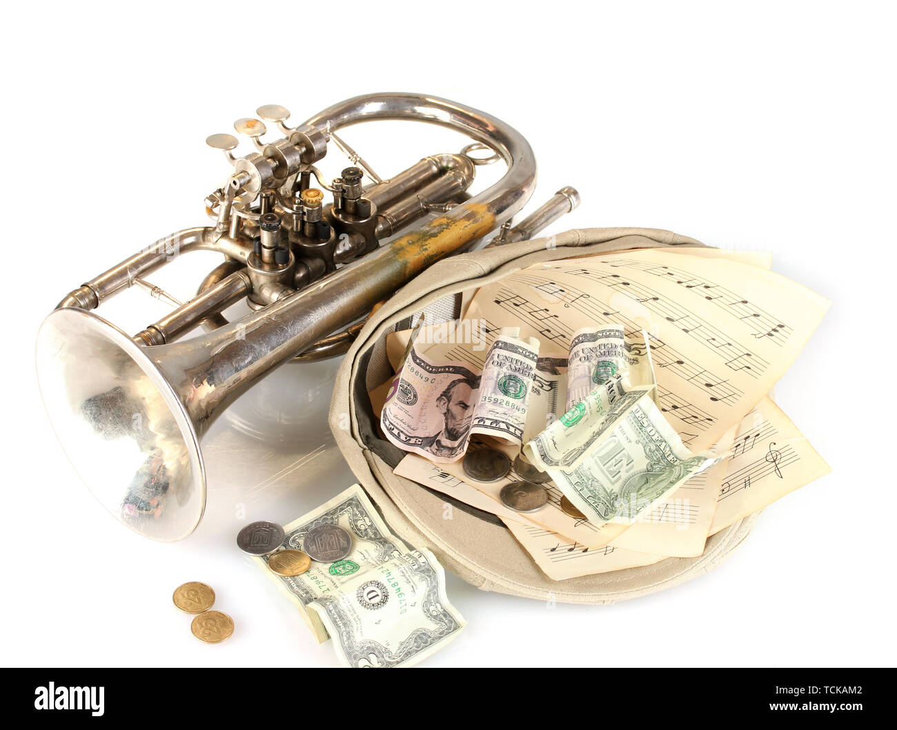 musical instrument with money isolated on white Stock Photo - Alamy