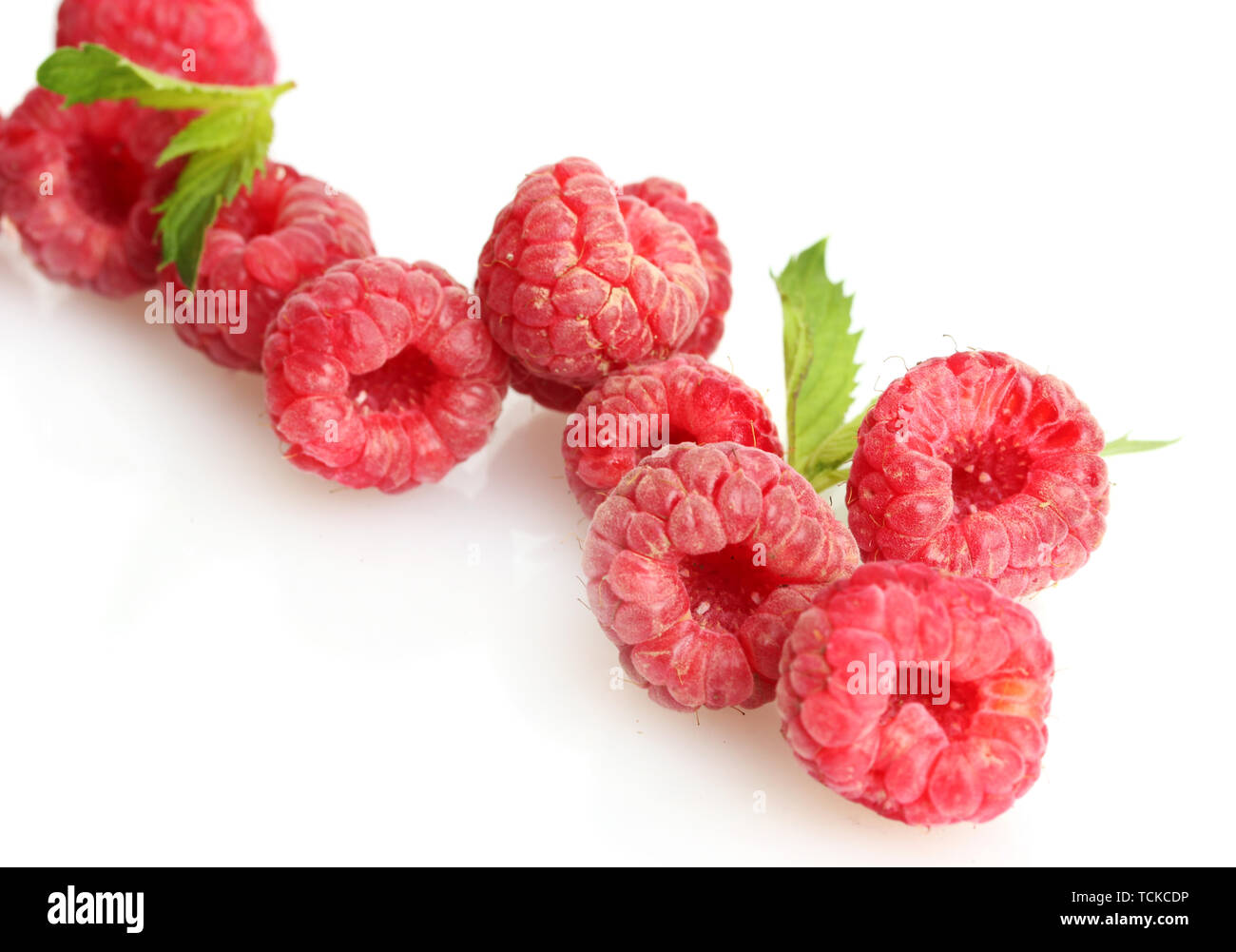 ripe raspberries with mint isolated on white Stock Photo - Alamy