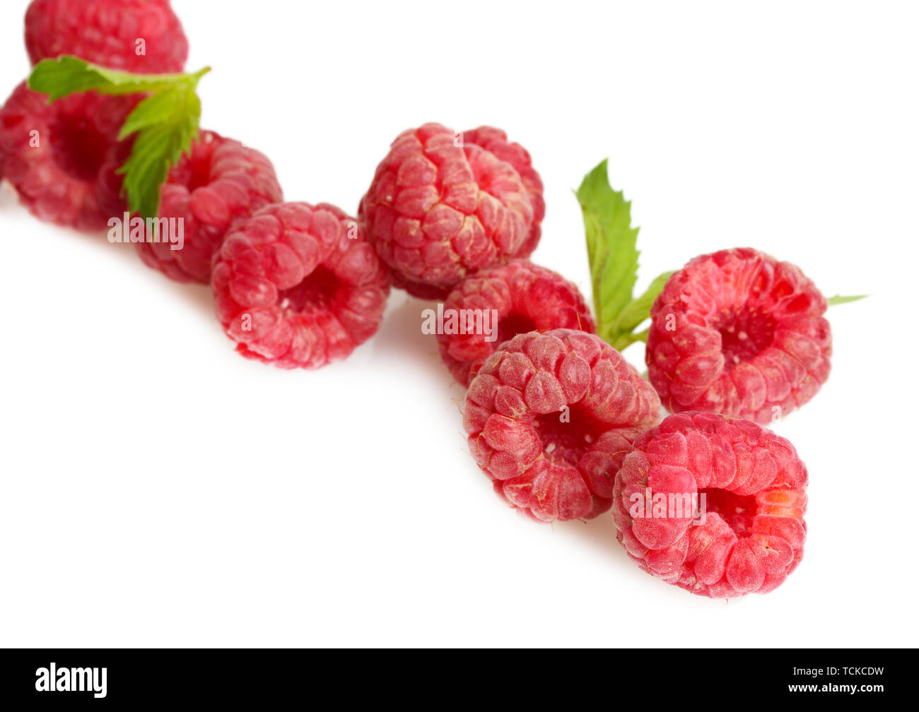 ripe raspberries with mint isolated on white Stock Photo - Alamy