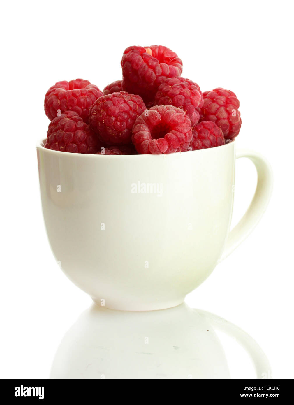 ripe raspberries in cup isolated on white Stock Photo - Alamy