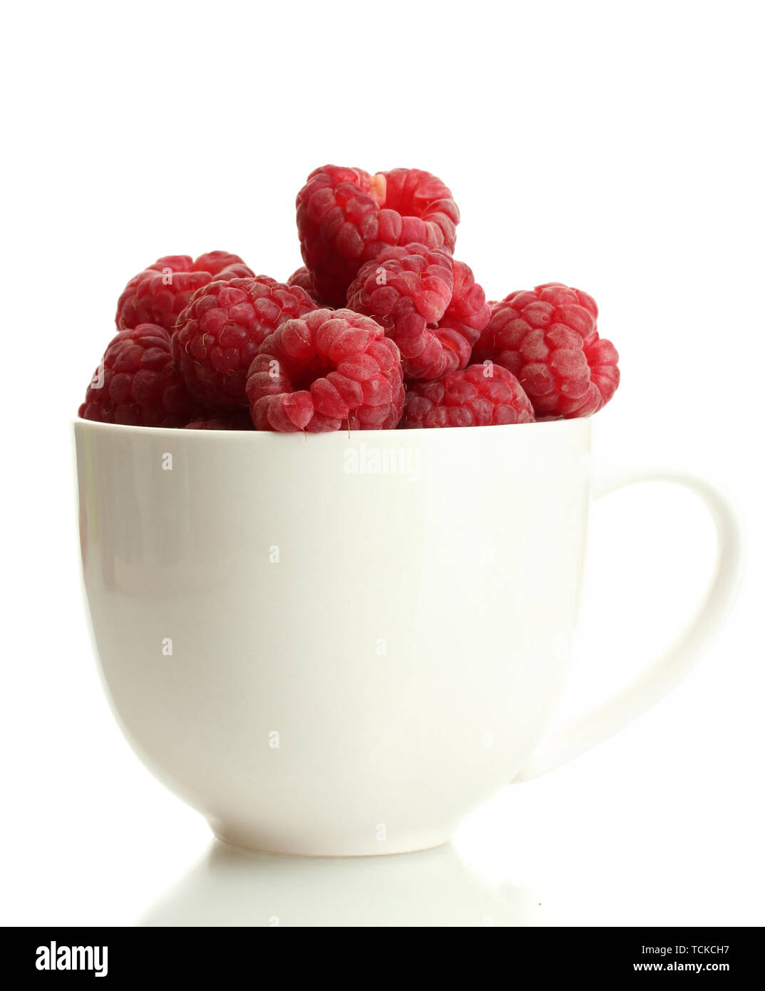 ripe raspberries in cup isolated on white Stock Photo - Alamy