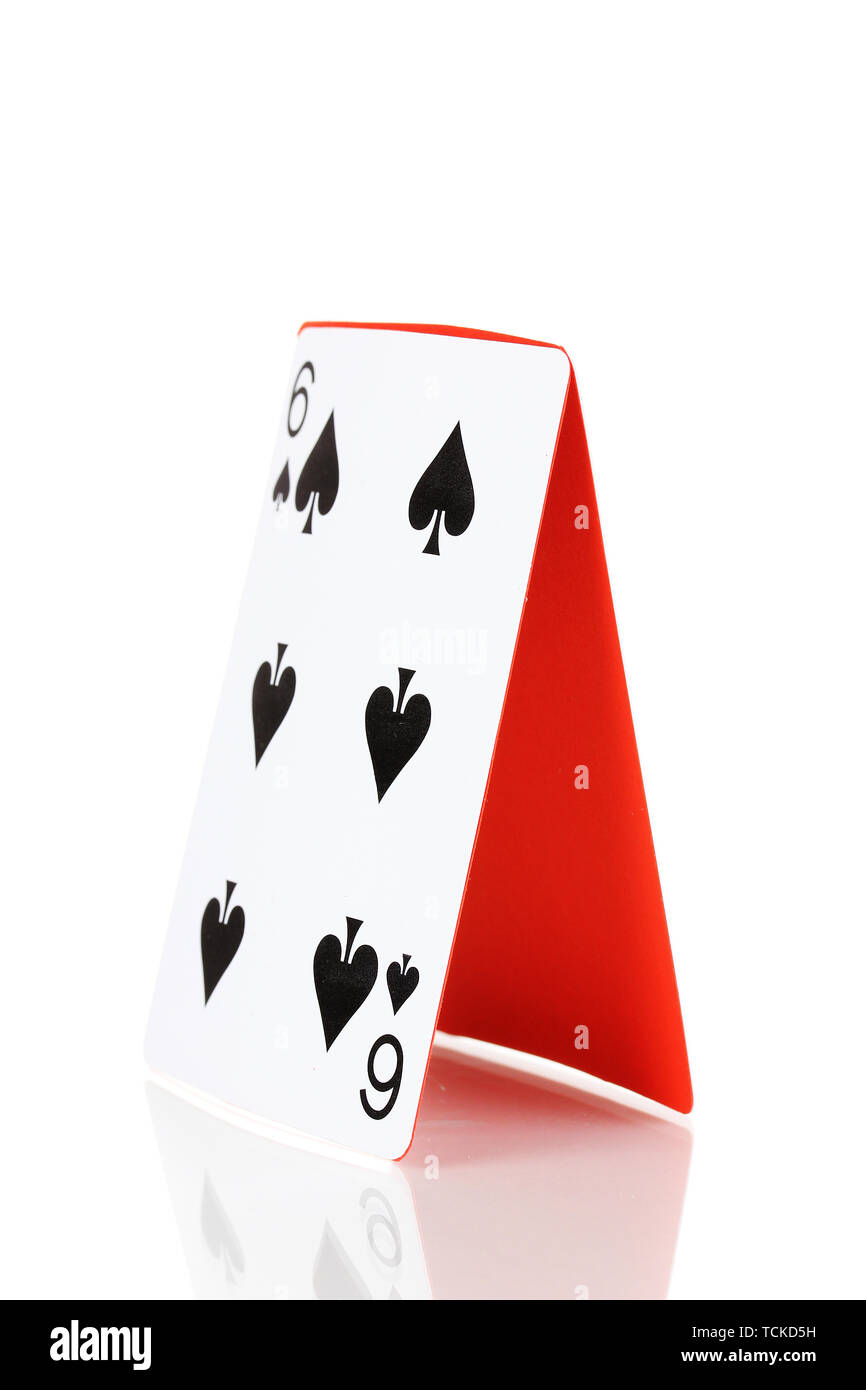 Card house isolated on white Stock Photo - Alamy
