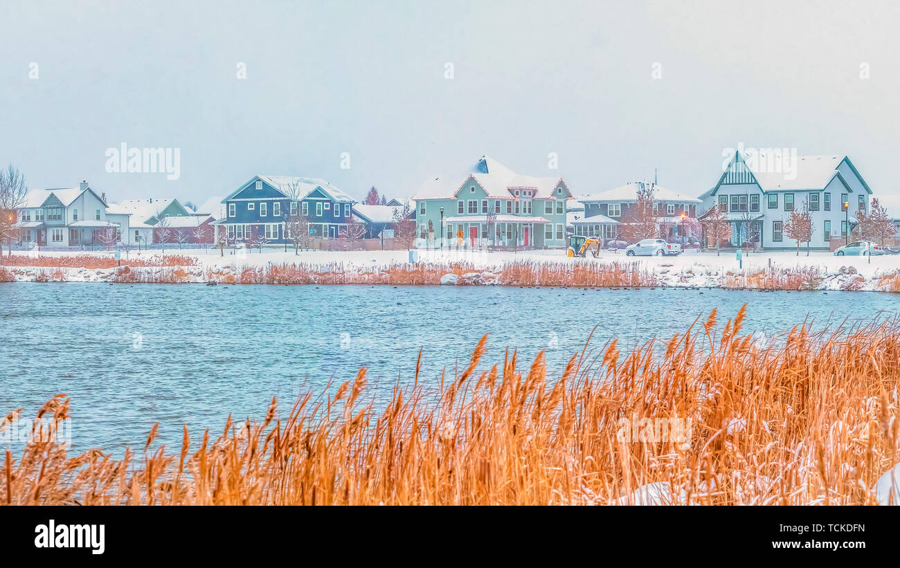 Panorama Beautiful rippling lake with yellowish brown grasses on the ...