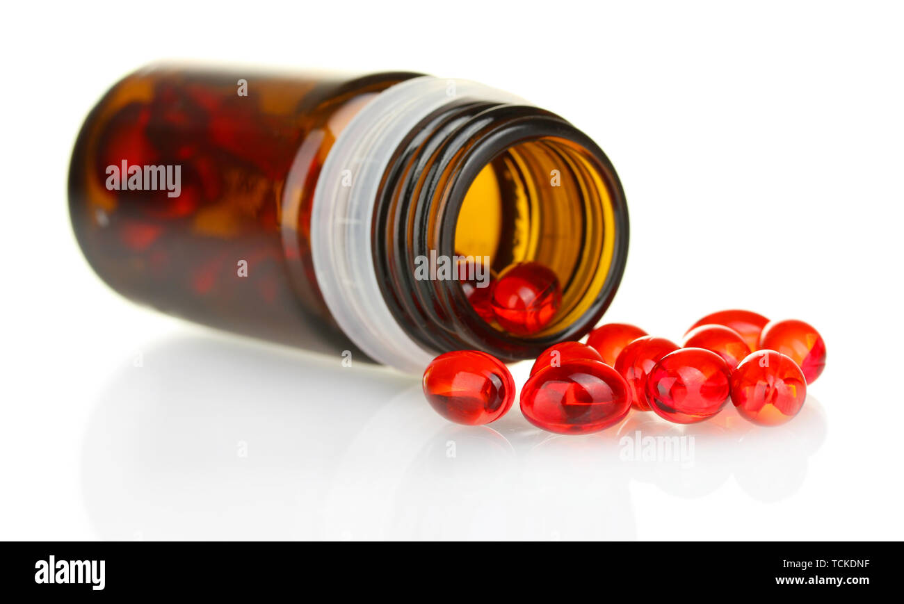 Jar of pills isolated on white Stock Photo - Alamy