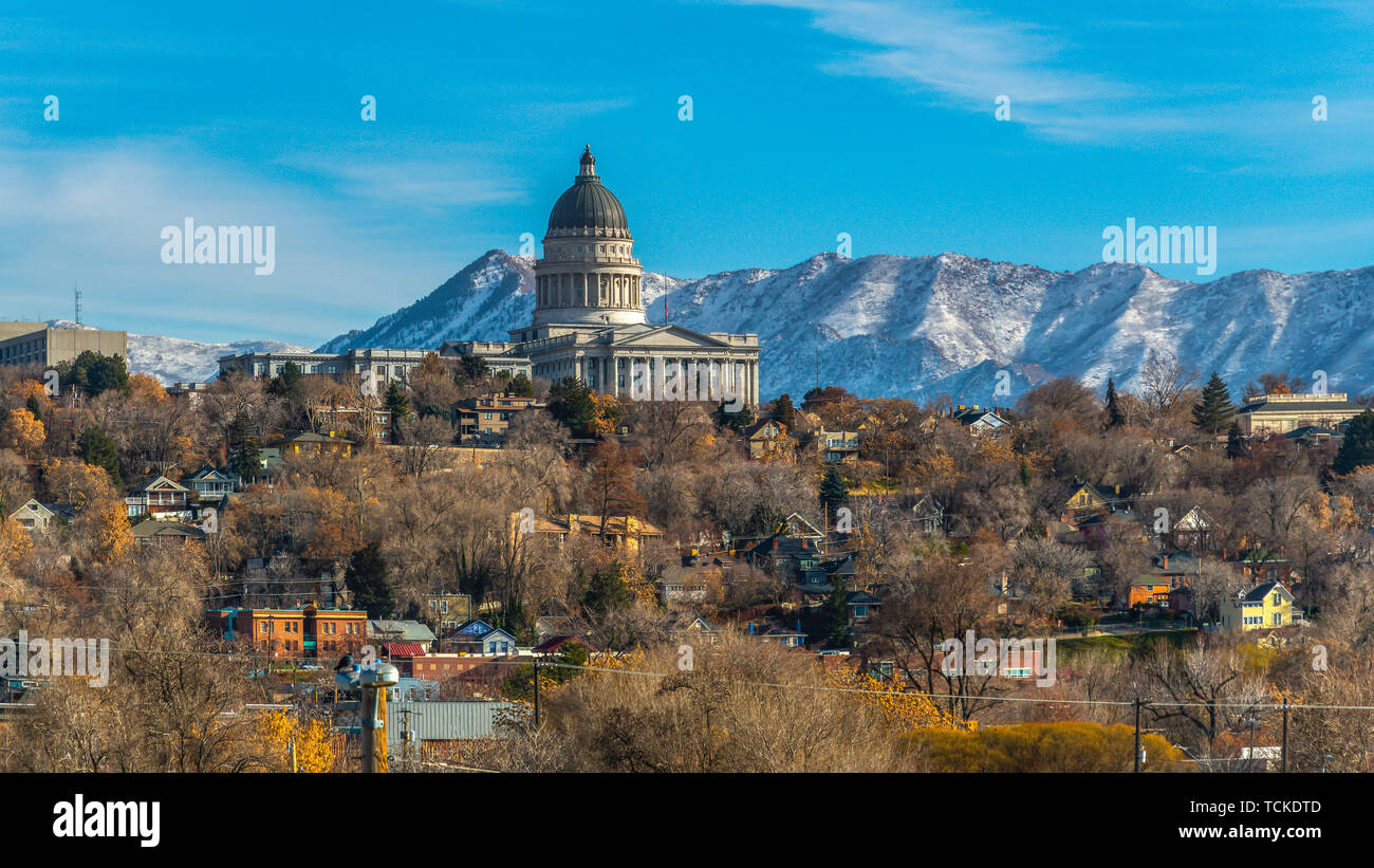 Panorama The majestic Utah State Capital Building towering over houses ...