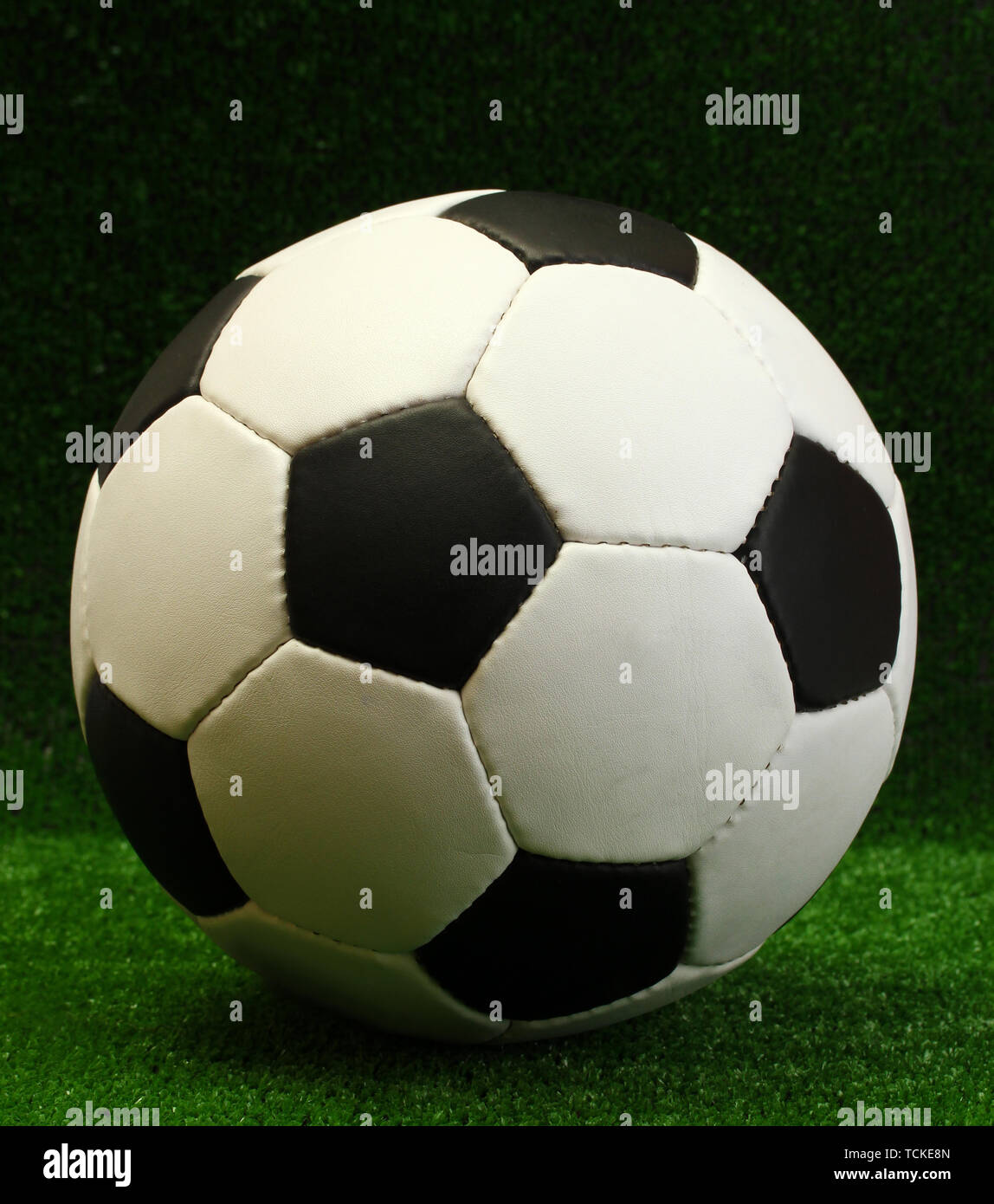 football ball on artificial green grass Stock Photo - Alamy