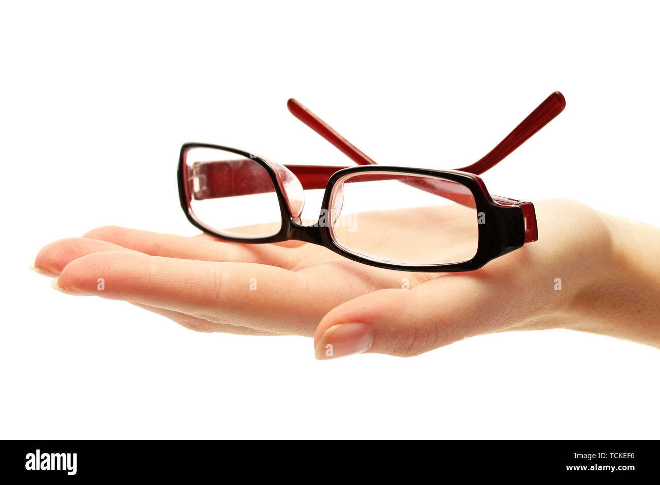 glasses on female hand, isolated on white Stock Photo - Alamy