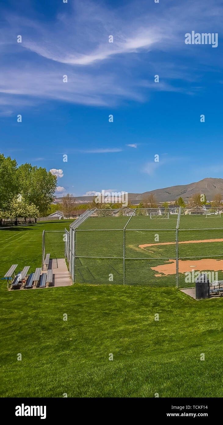 Panorama frame Baseball or Softball field with bleachers outside the ...