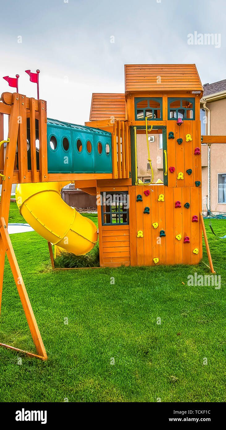 Panorama Playground structure with slide swings playhouse tower and ...