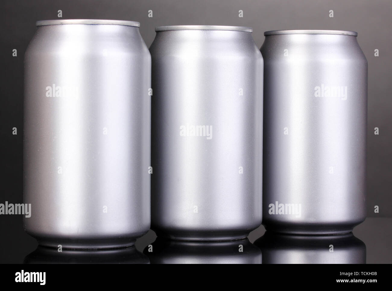 aluminum cans on grey background Stock Photo - Alamy