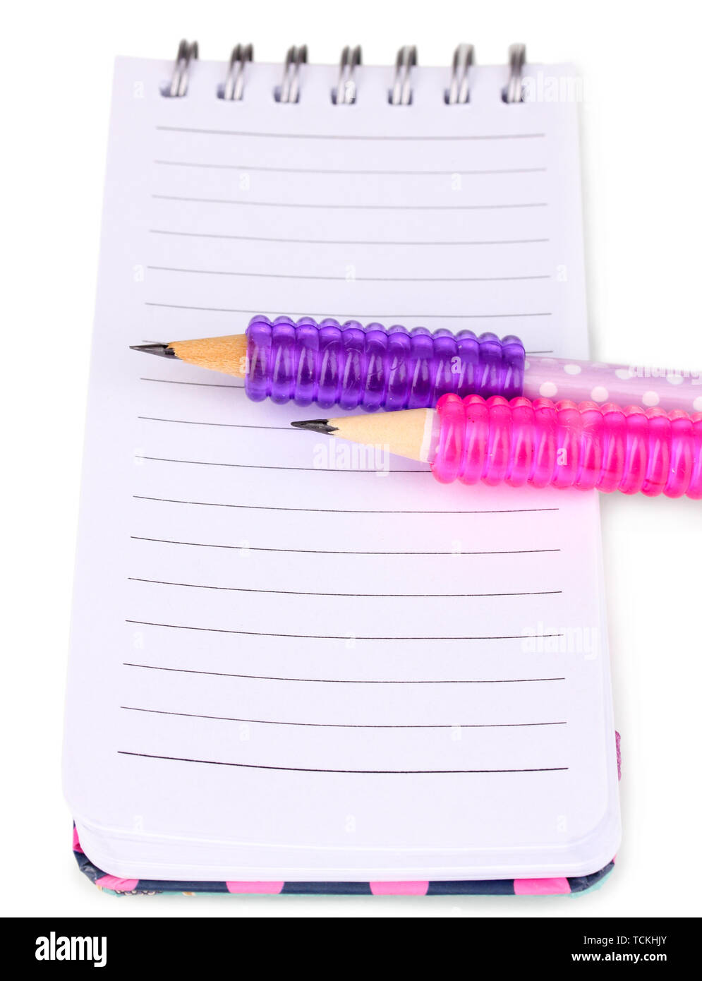 Pencils and notepad isolated on white Stock Photo - Alamy
