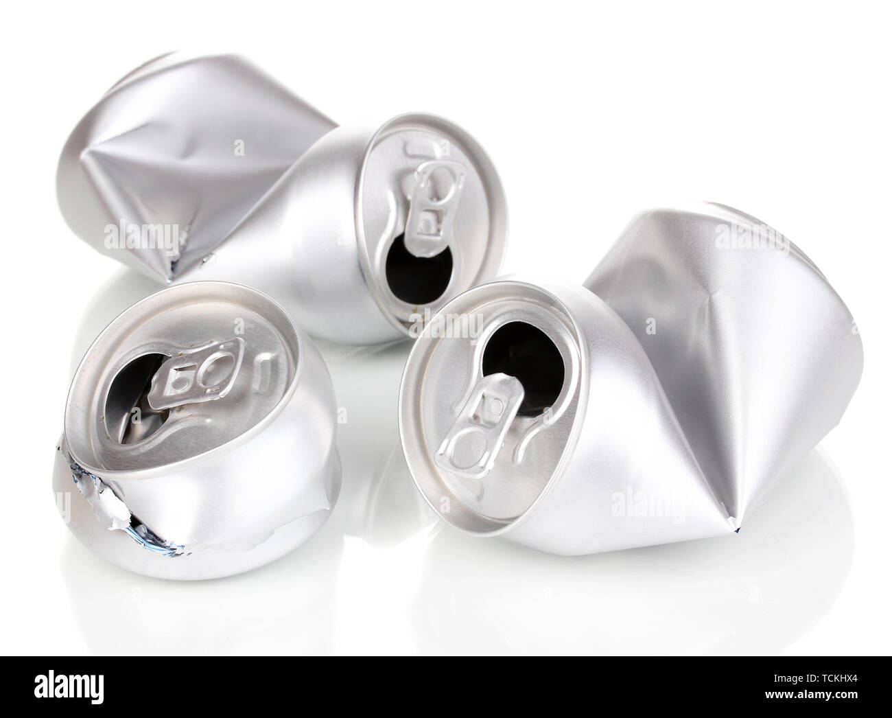 crumpled empty cans isolated on white Stock Photo - Alamy