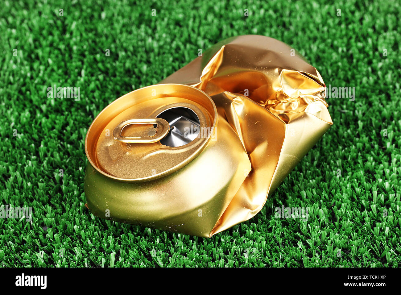 crumpled empty can on grass Stock Photo - Alamy