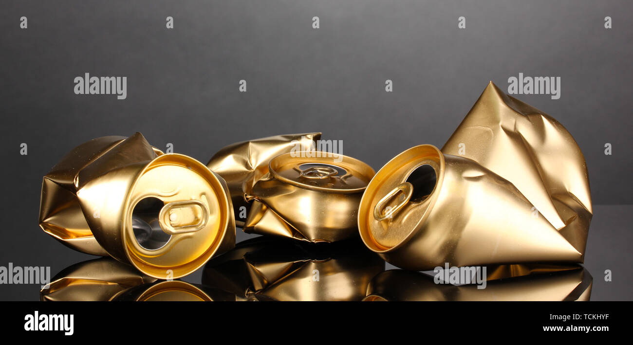 crumpled empty can on grey background Stock Photo - Alamy
