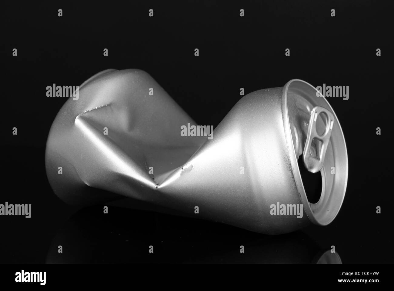 Crumpled tin can Black and White Stock Photos & Images - Alamy