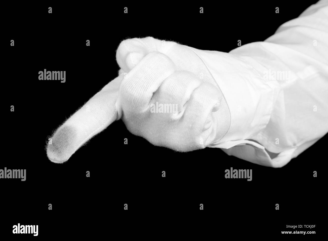 Auditor hand checking cleanliness isolated on black Stock Photo - Alamy