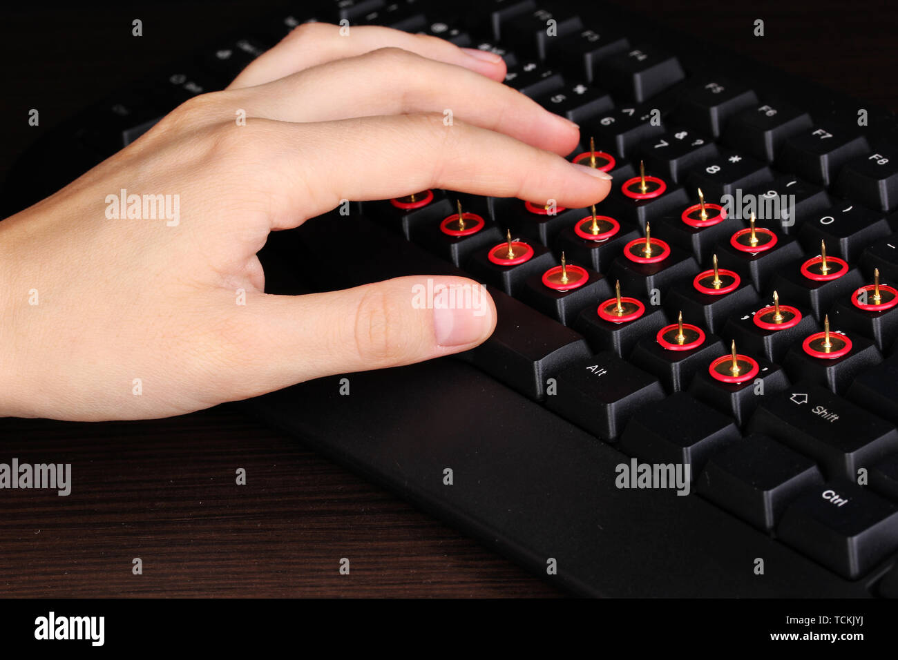 Painful typing on keyboard close-up Stock Photo - Alamy