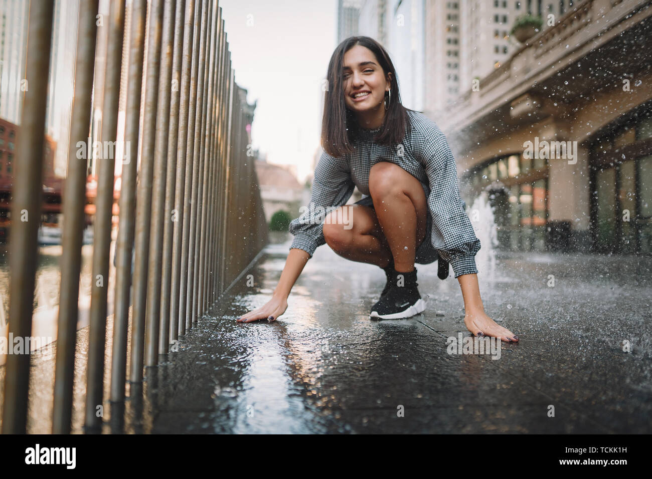 Young woman dancing fountain hi-res stock photography and images - Alamy